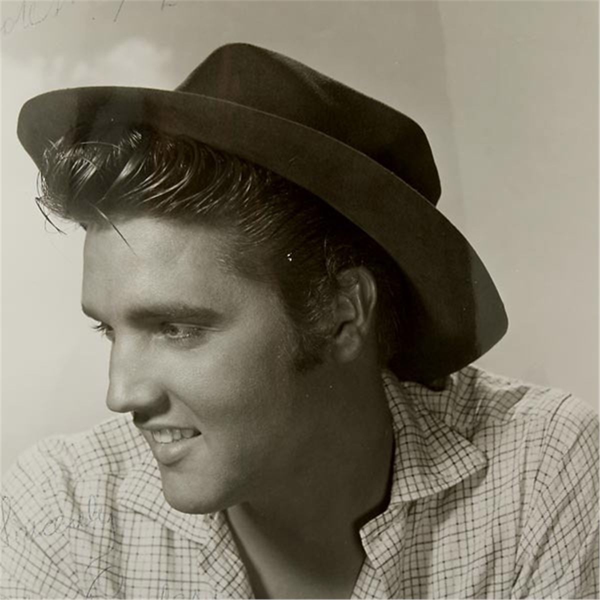 Elvis Love Me Tender Hat With Checkered Shirt.