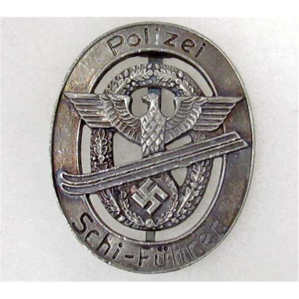 GERMAN NAZI POLIZEI SCHI-FUHRER BADGE