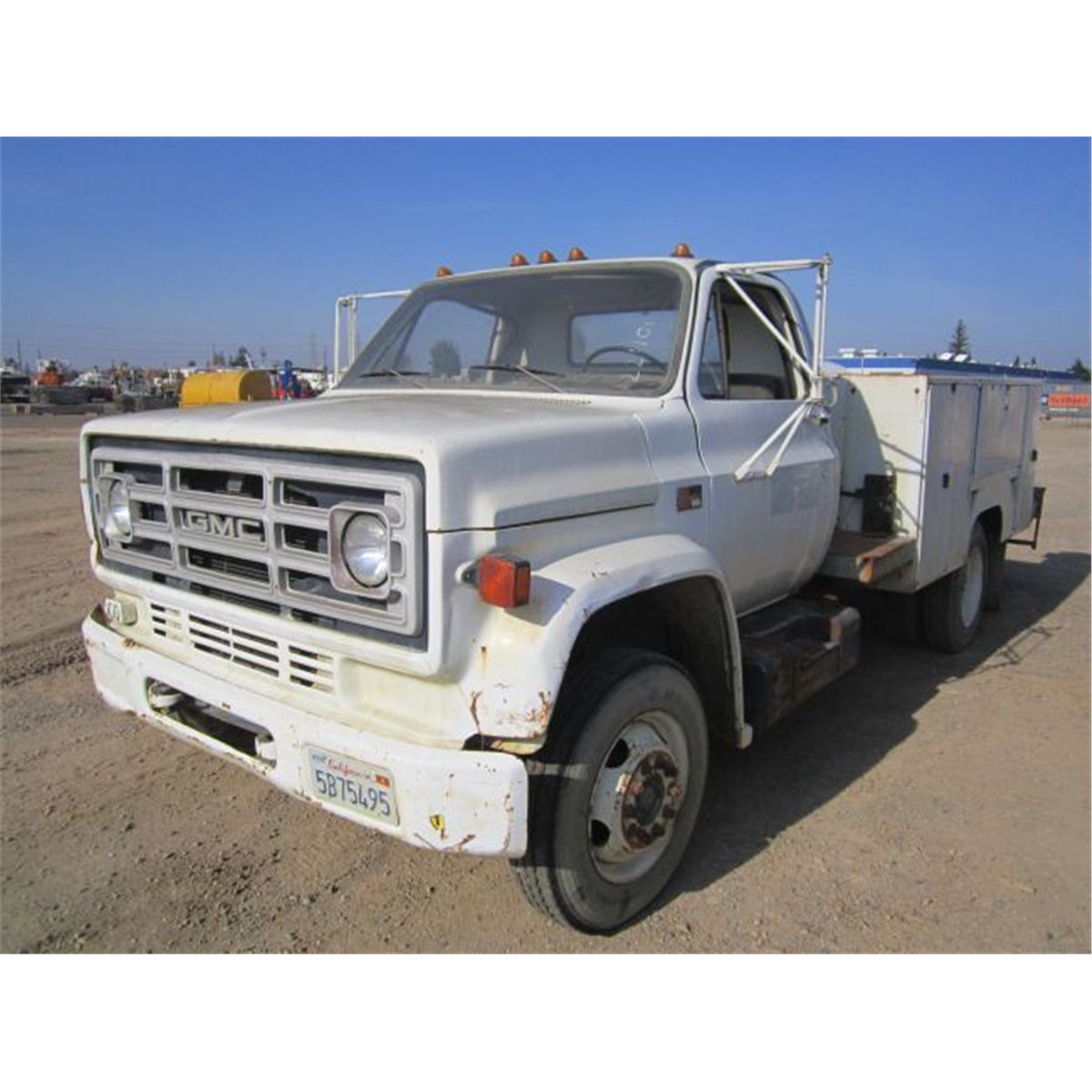 1985 GMC 6000 S/A Utility Truck