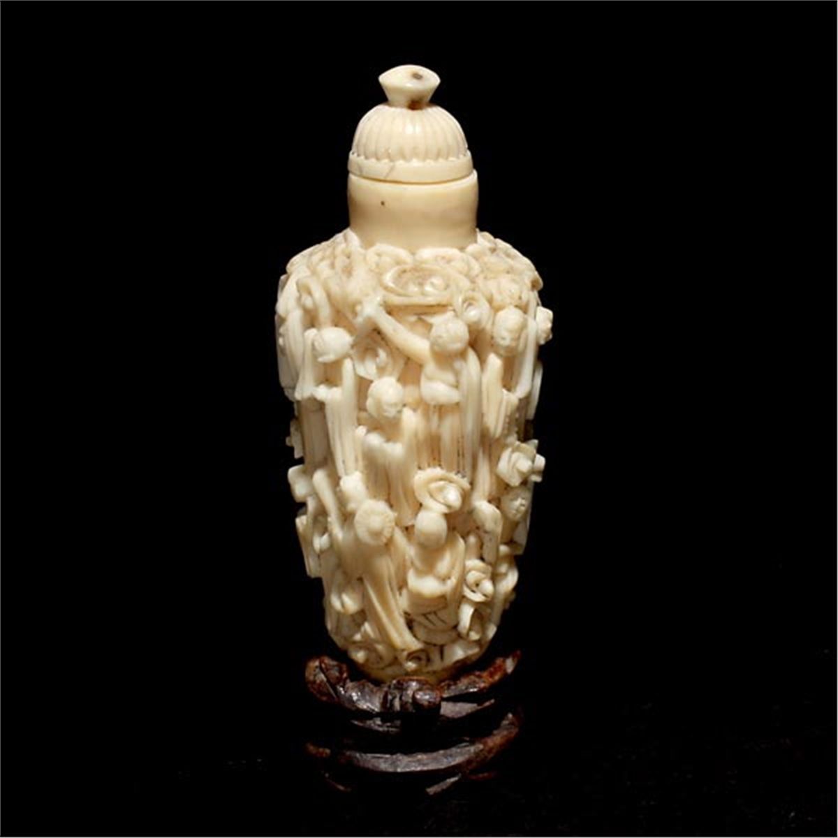 Two Carved Ivory Snuff Bottles*