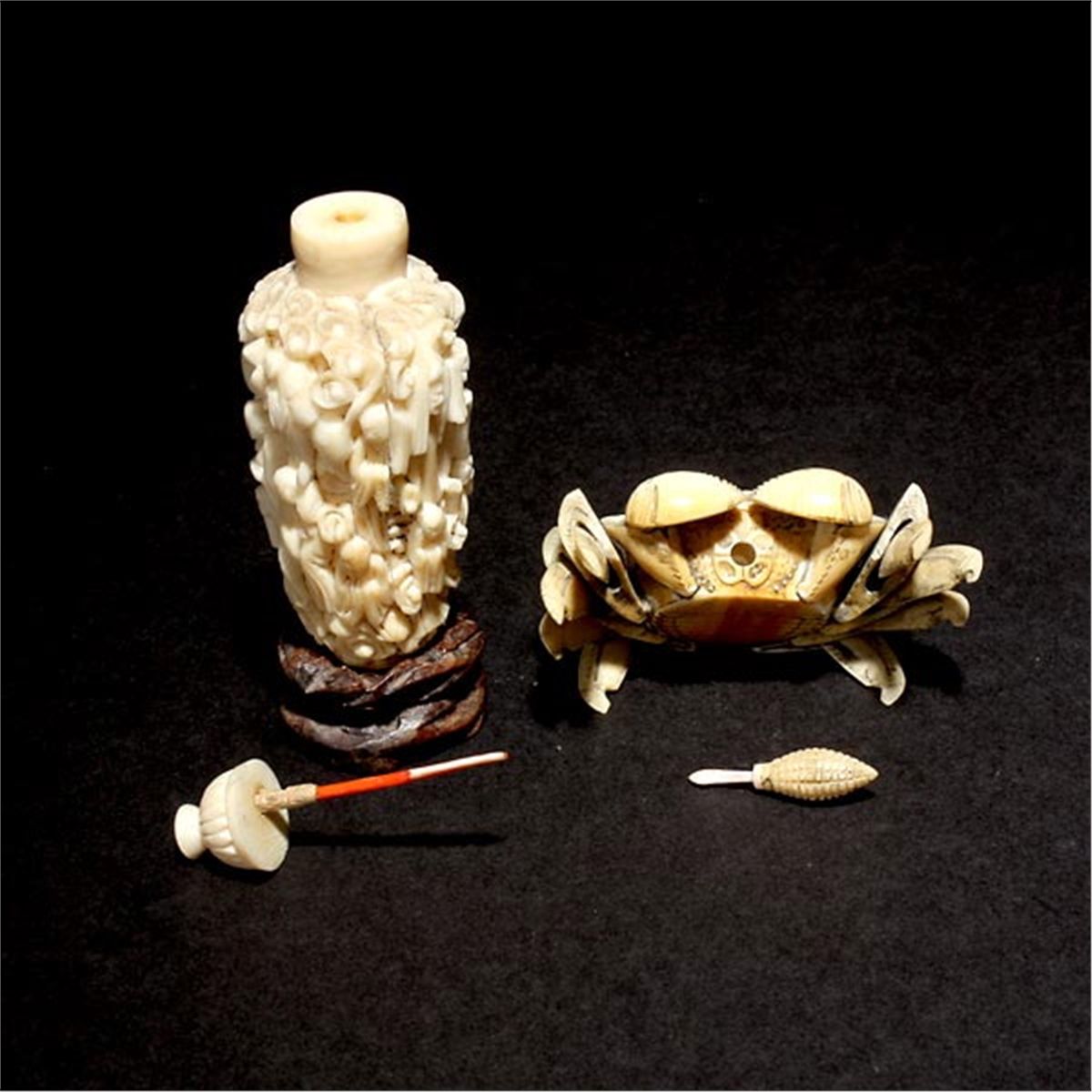Two Carved Ivory Snuff Bottles*