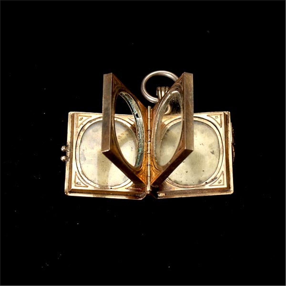 14K YELLOW GOLD BOOK LOCKET PENDANT.