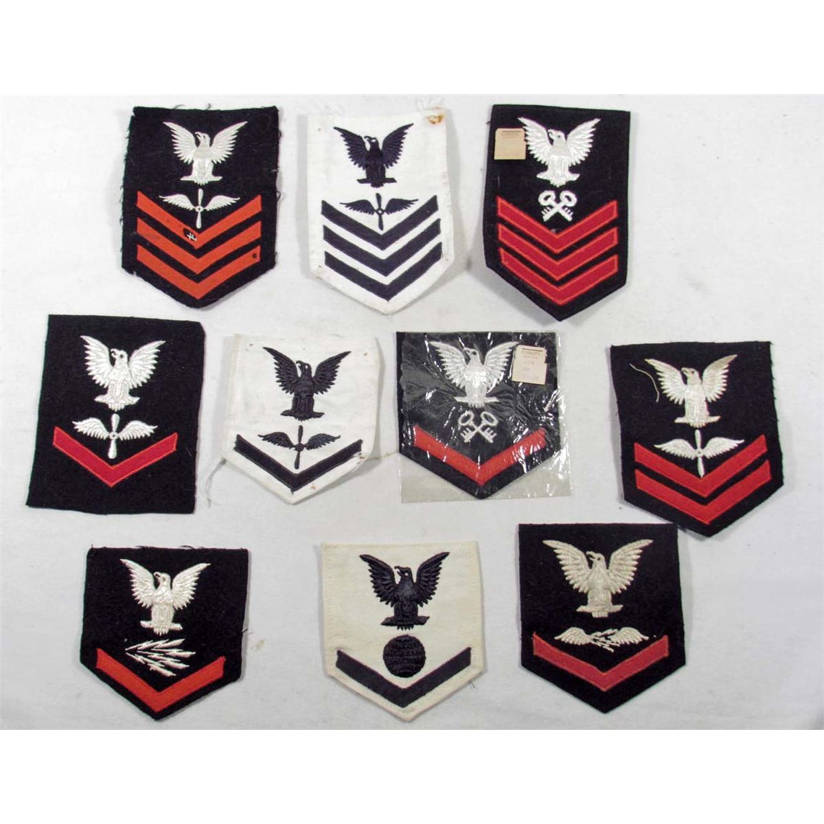 LOT OF 10 USN WW2 NAVAL EM SLEEVE RATINGS