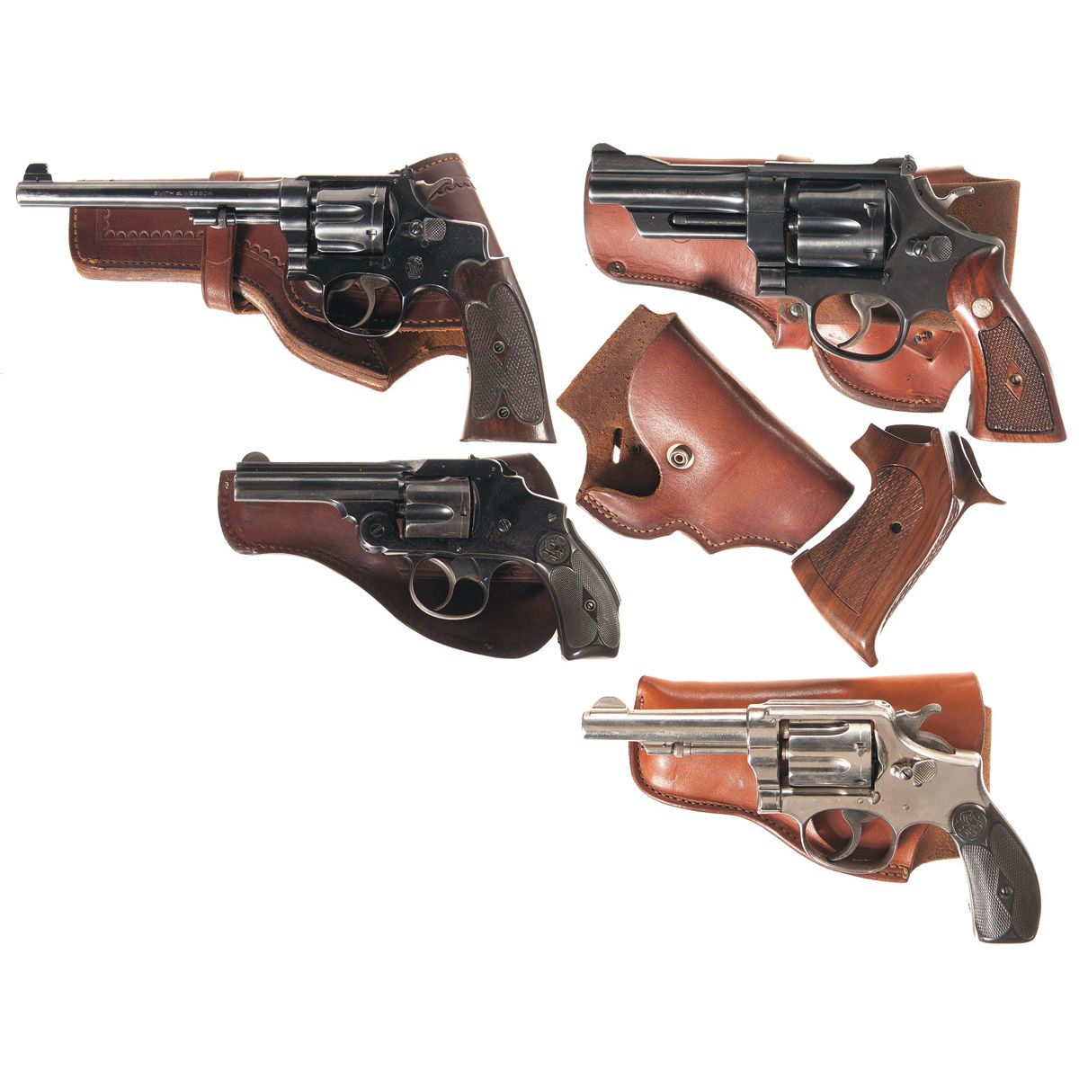 Four Smith & Wesson Double Action Revolvers with Holsters and One Box ...