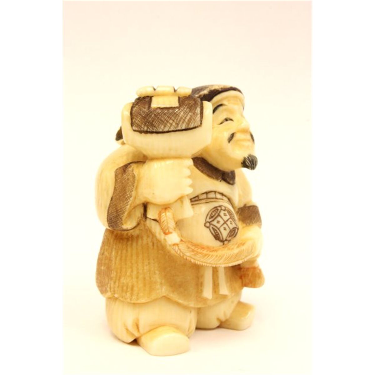 Ivory Chinese Netsuke of "Man Carrying a Tool"
