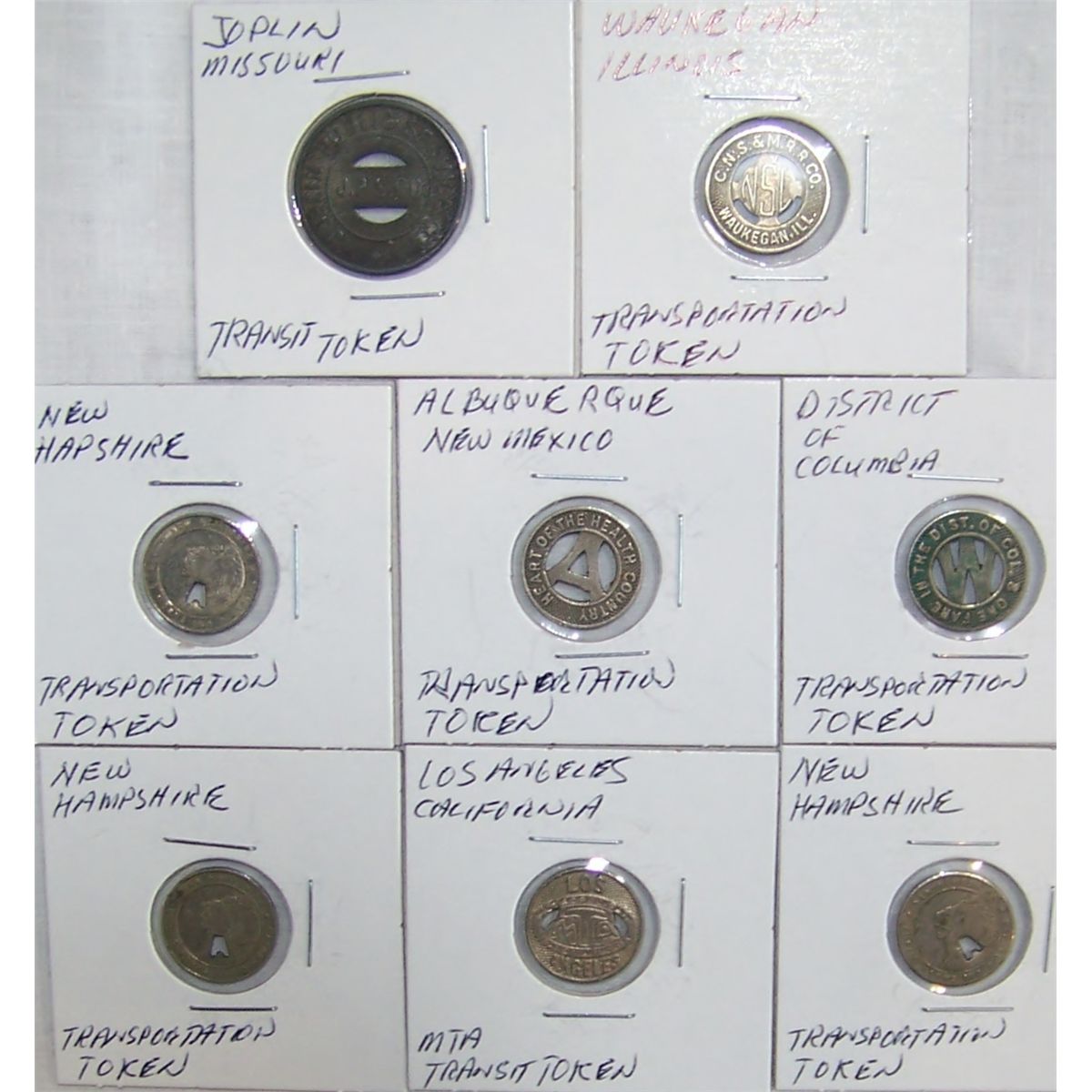 (8X$) RARE TRANSIT TOKENS.