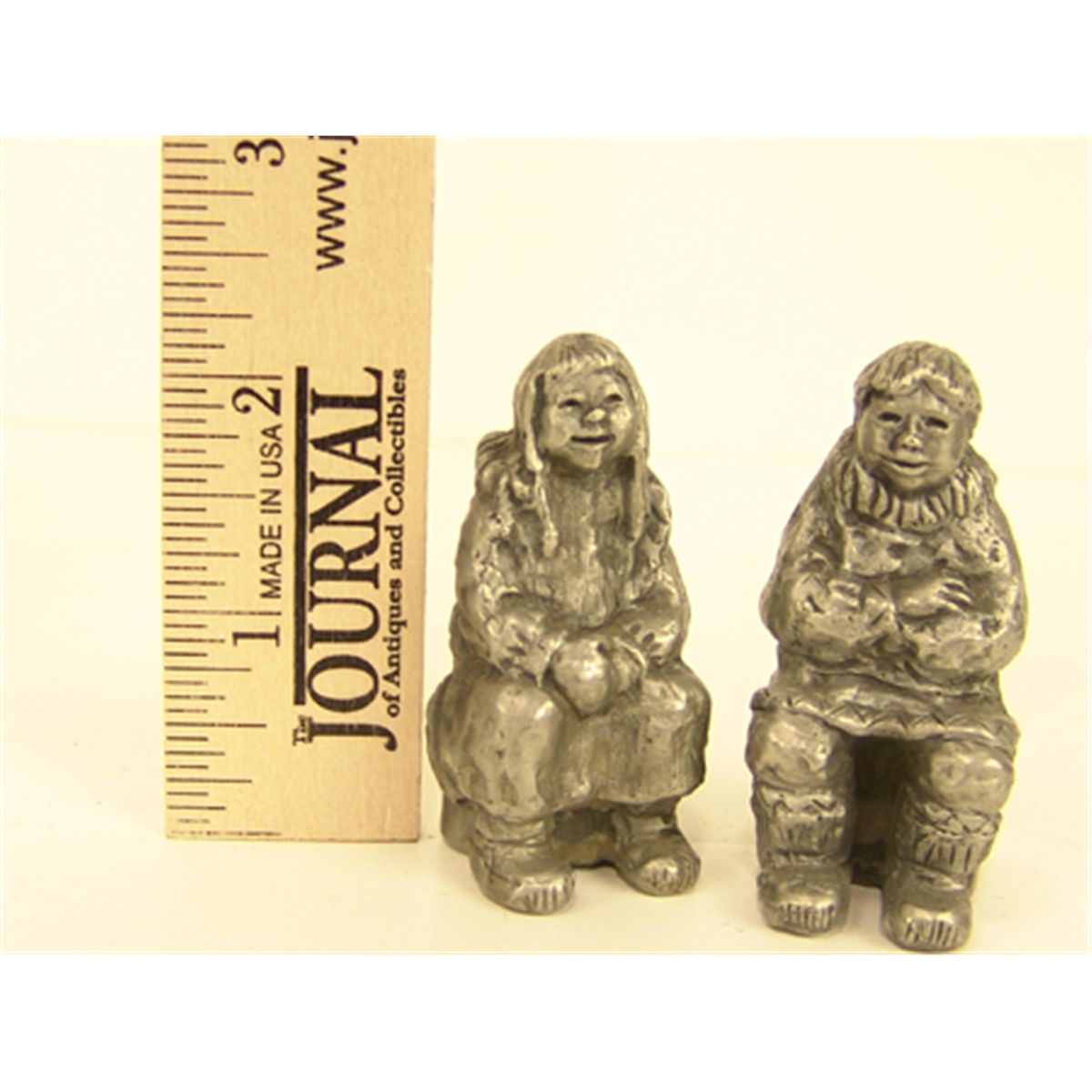 2 Eskimo Figurines - C. Alan Johnson
