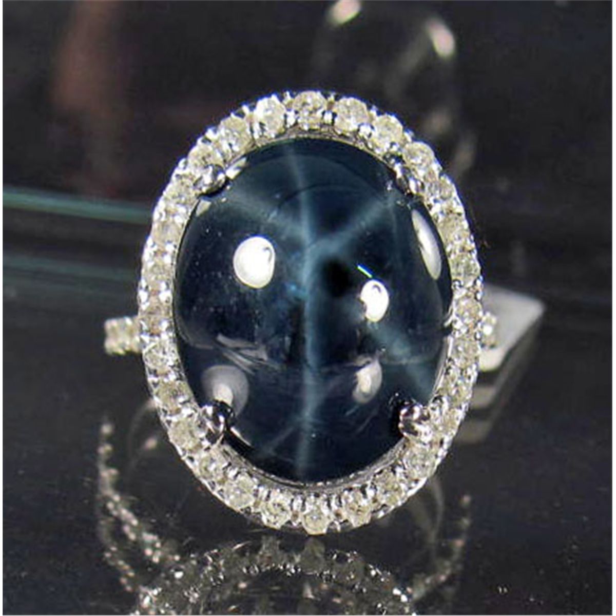 69229 - 14K WHITE GOLD BLUE STAR SAPPHIRE AND DIAMOND RING - SIZE 5