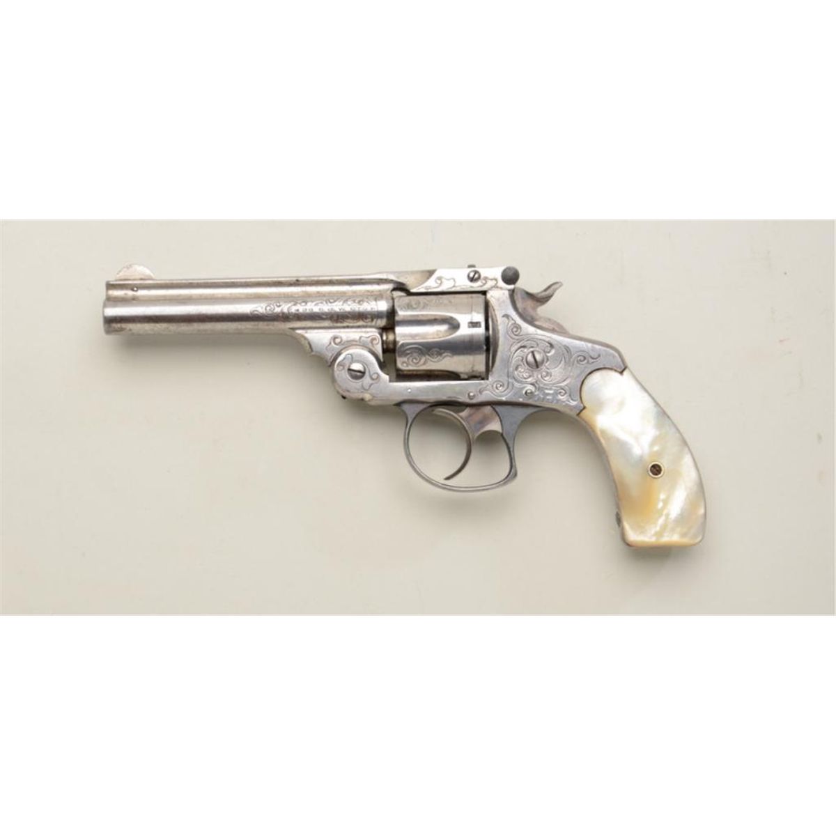 Engraved Smith & Wesson top-break revolver, .38 cal., 4” barrel, nickel ...