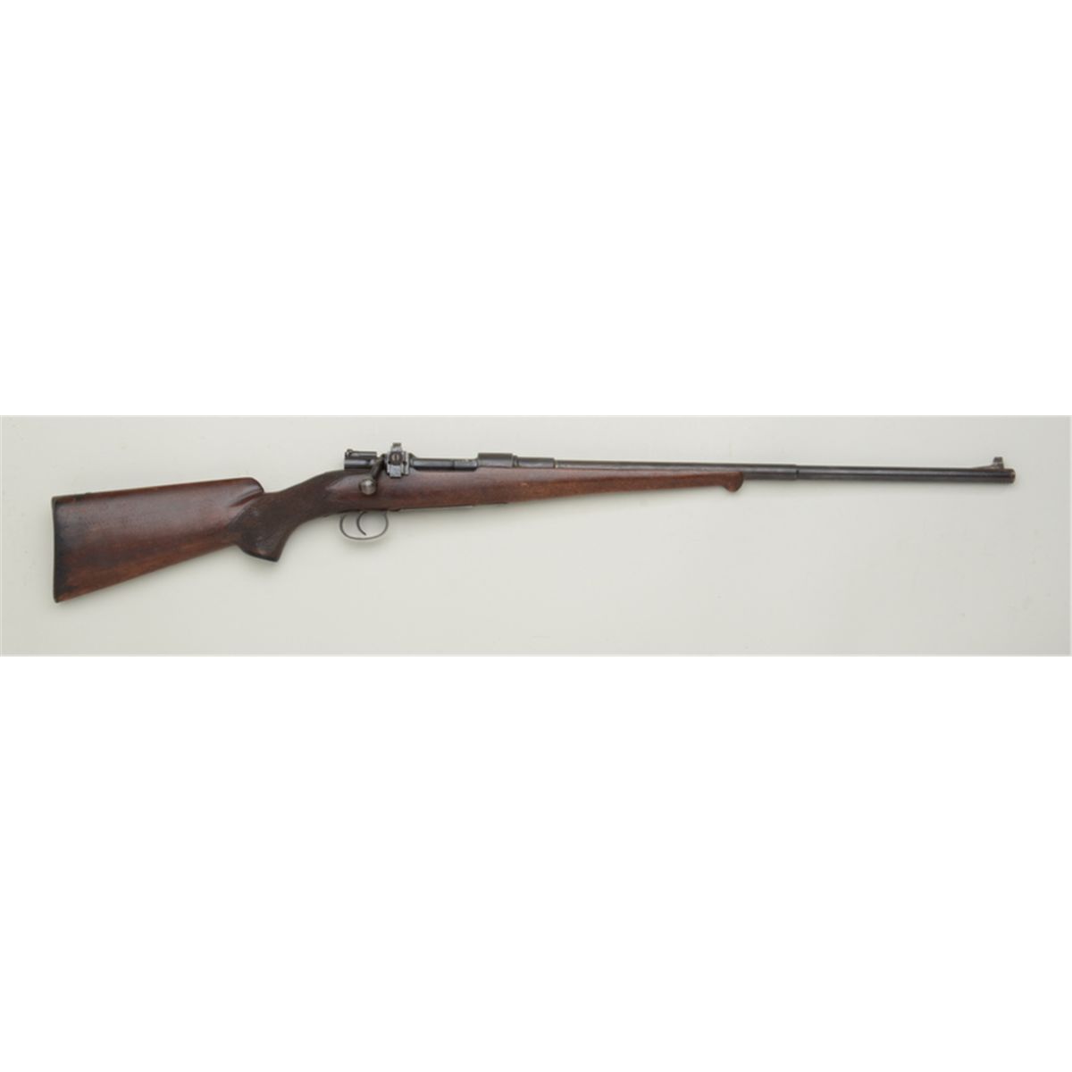 Sporterized Mauser bolt-action rifle, 7mm cal., blue finish, checkered ...