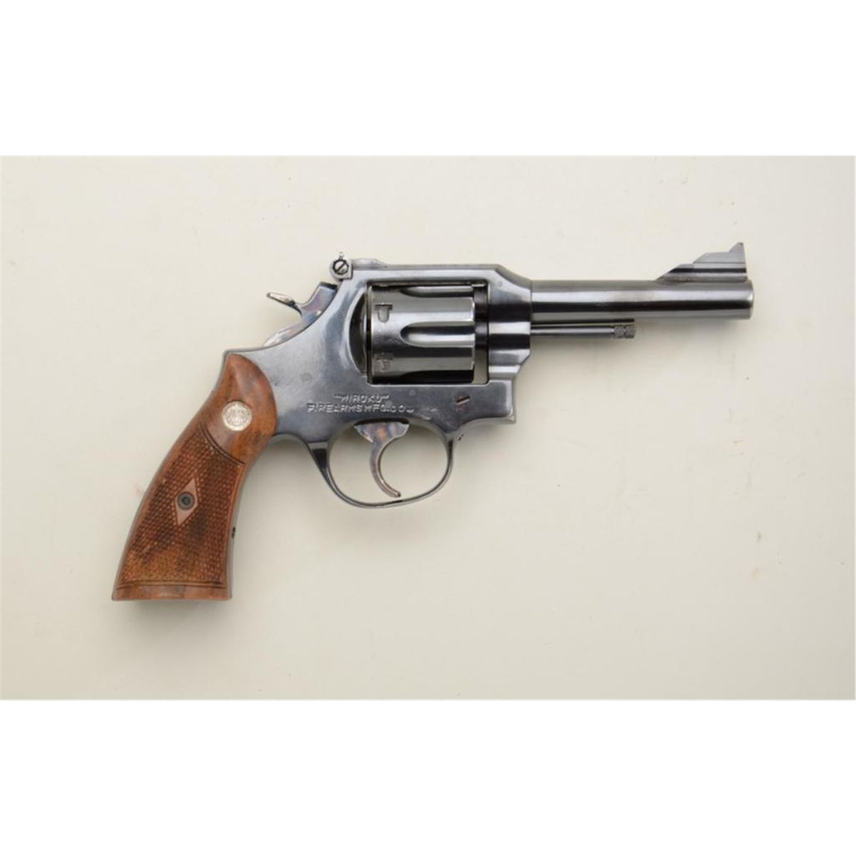 Miroku DA revolver, .38 Special cal., 4” barrel, blue finish, checkered ...