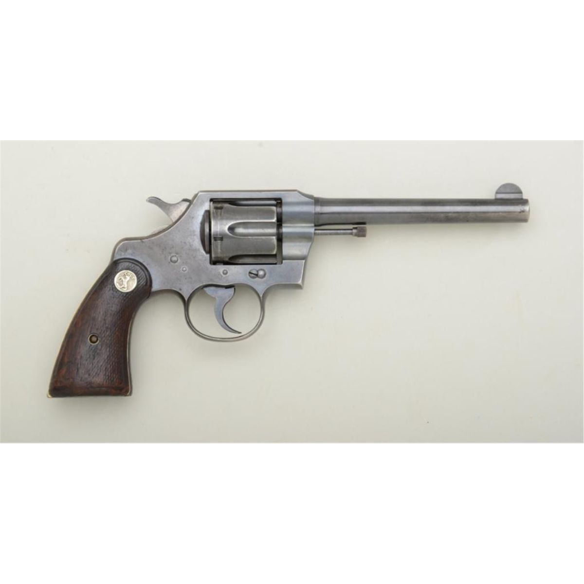 Colt Official Police DA revolver, .38 cal., 6” barrel, blue finish ...