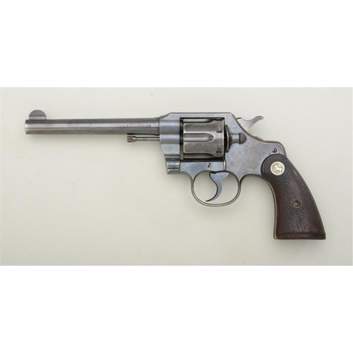 Colt Official Police DA revolver, .38 cal., 6” barrel, blue finish ...