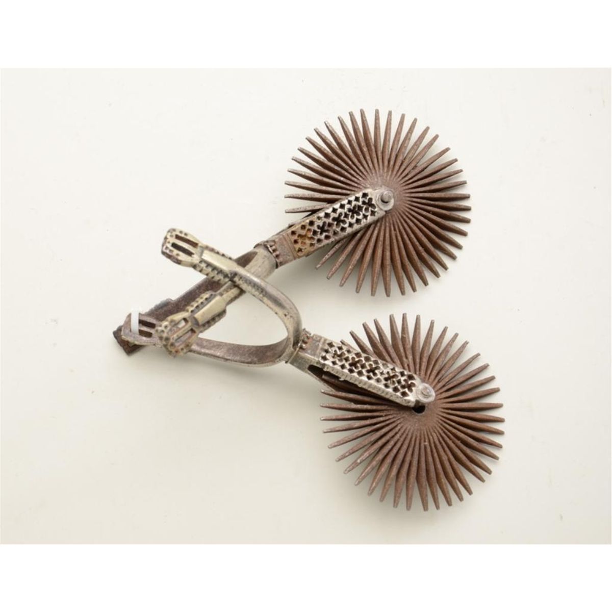 Pair of large rowel antique South American gaucho spurs in overall ...