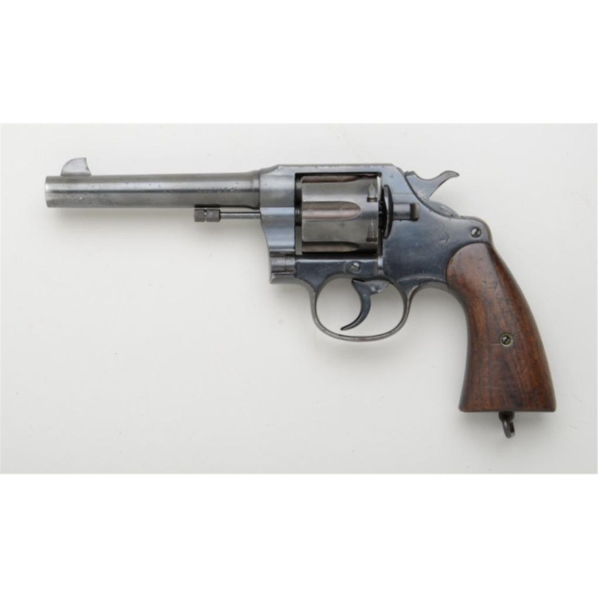 Colt U.S. Army Model 1917 DA revolver, .45 cal., 5-1/2” barrel, military blue finish, wood grips,