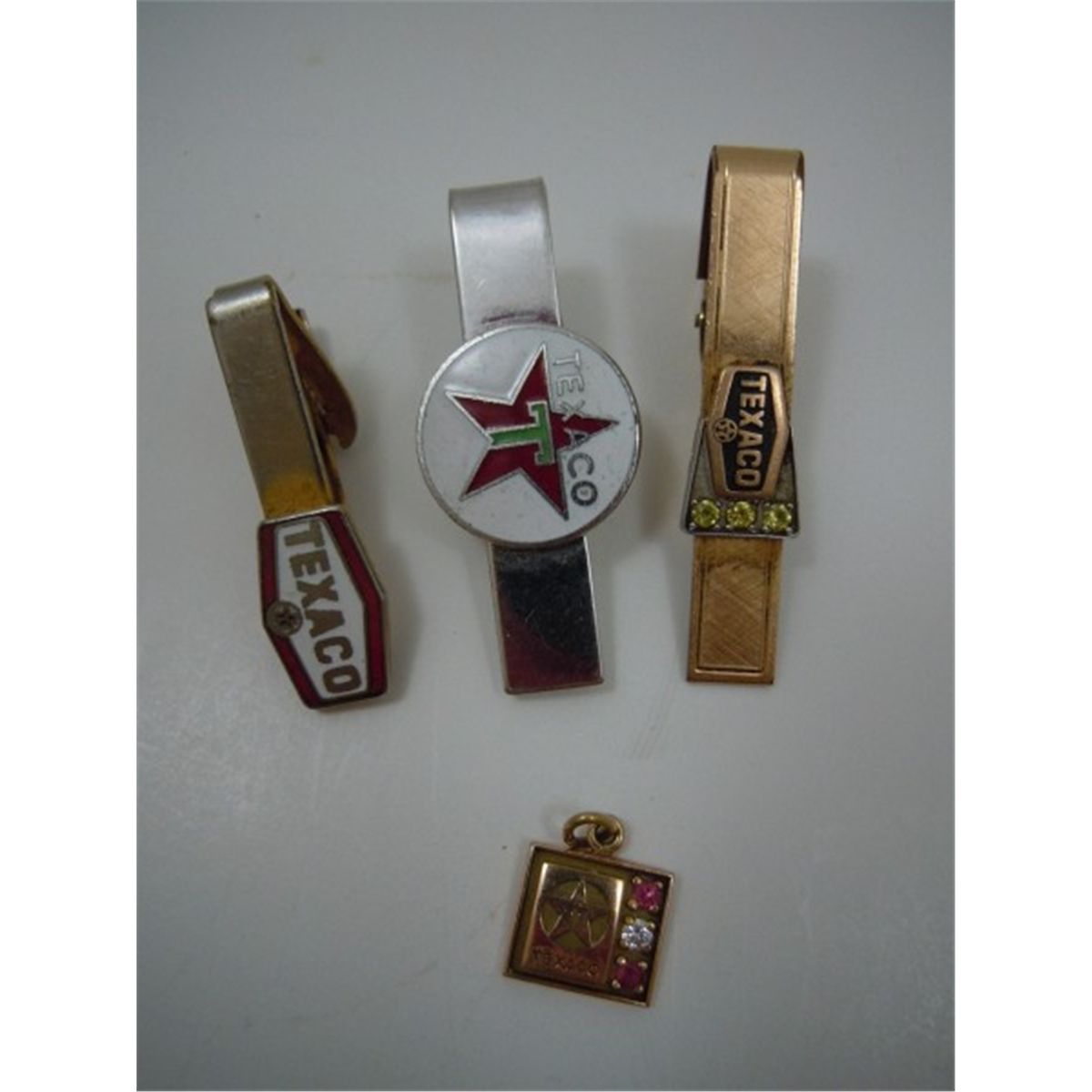 Texaco tie tabs and necklace pendant