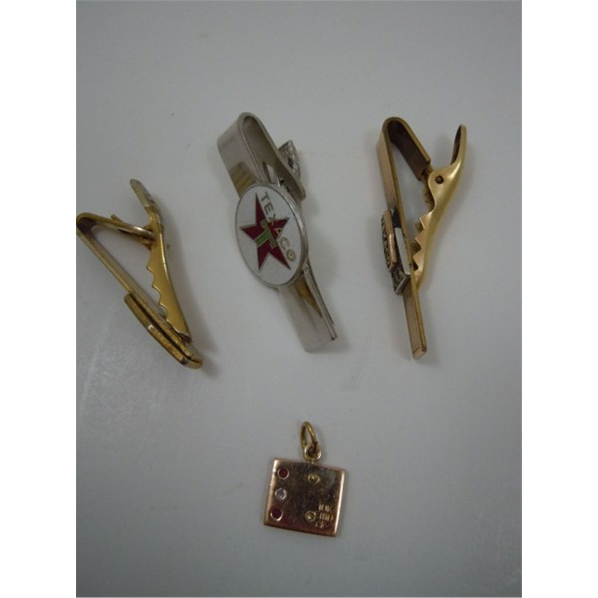 Texaco tie tabs and necklace pendant
