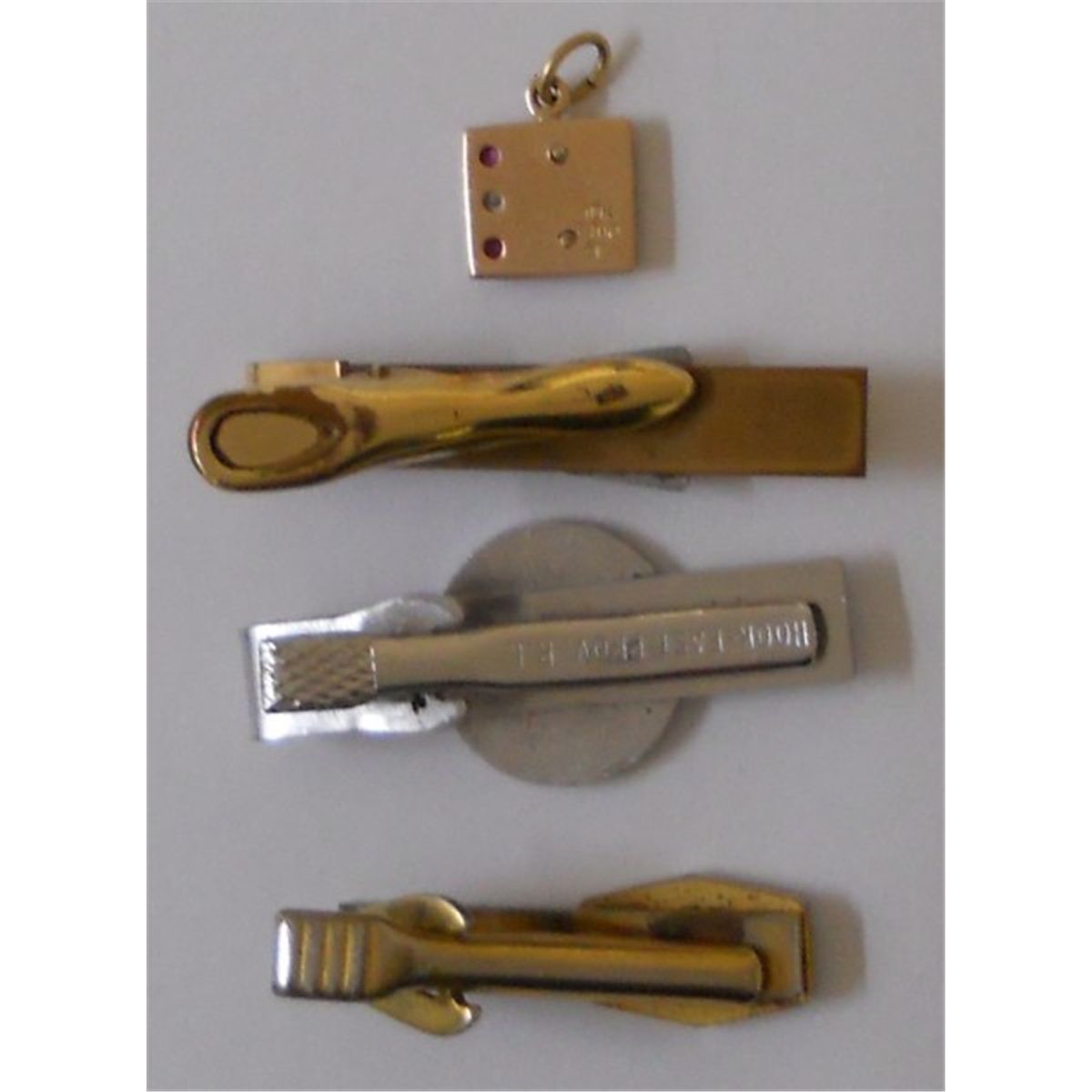 Texaco tie tabs and necklace pendant