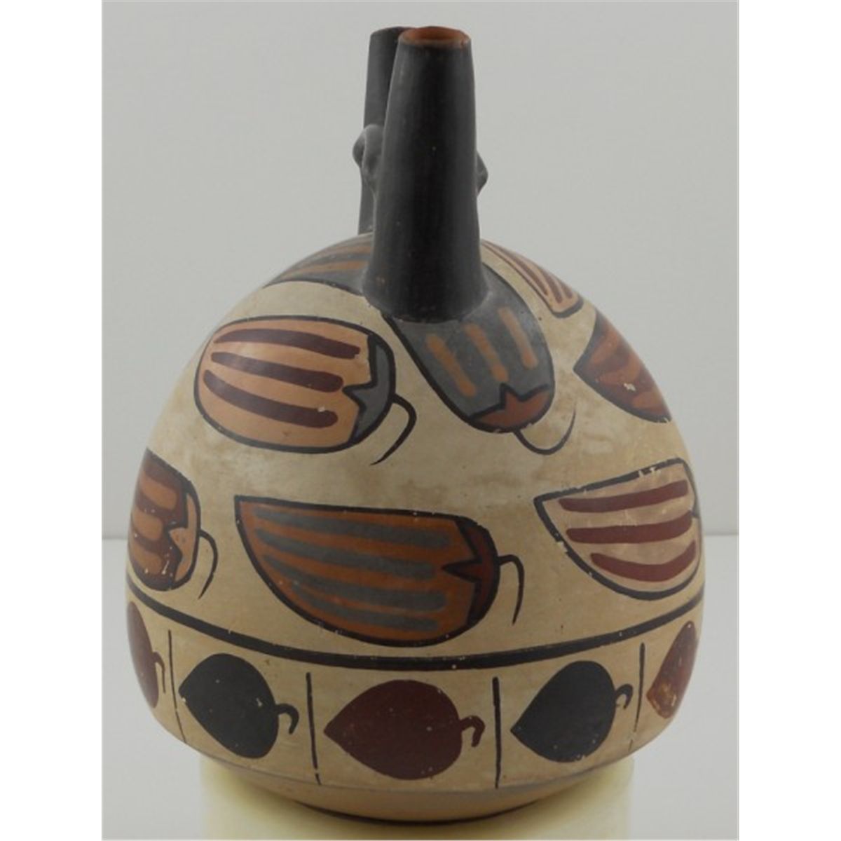 Nazca pottery, double spout bridged with "pepper" pattern