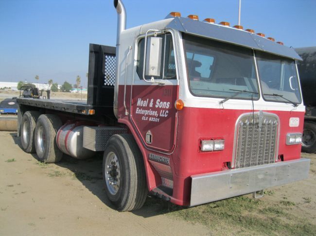 1985 Kenworth L700 Cab-Over Flatbed Truck