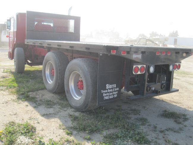 1985 Kenworth L700 Cab-Over Flatbed Truck
