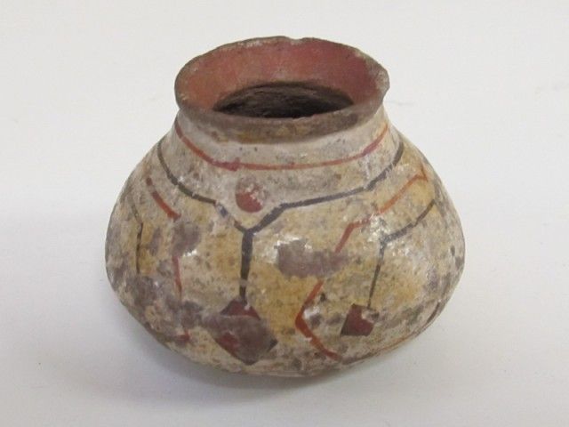 Small native red pottery miniature vessel.