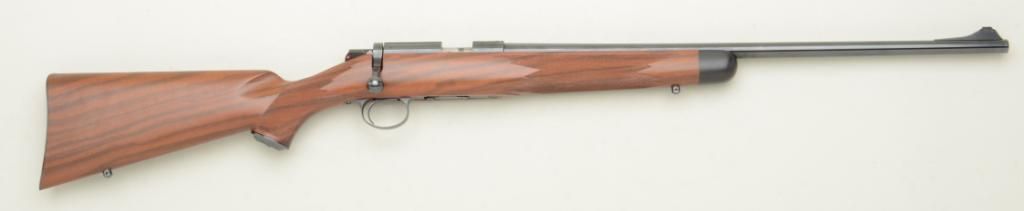 Kimber Model 82 bolt-action rifle, .22 WMR cal., 22” round barrel, blue ...