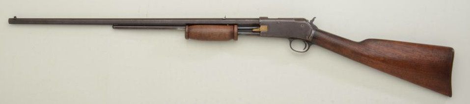 Colt Lightning magazine fed pump action rifle, .22 cal., brown patina ...