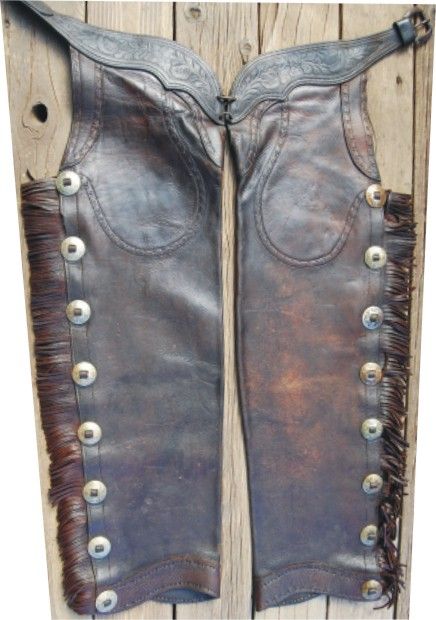 Circa 1900 Lawrence step in chaps w/ 16 conchos and tooled belt