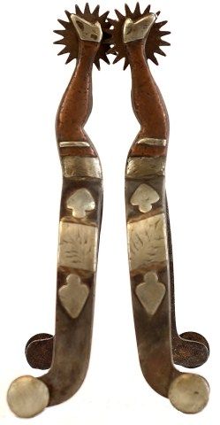 Pair unmarked McChesney lady leg spurs.