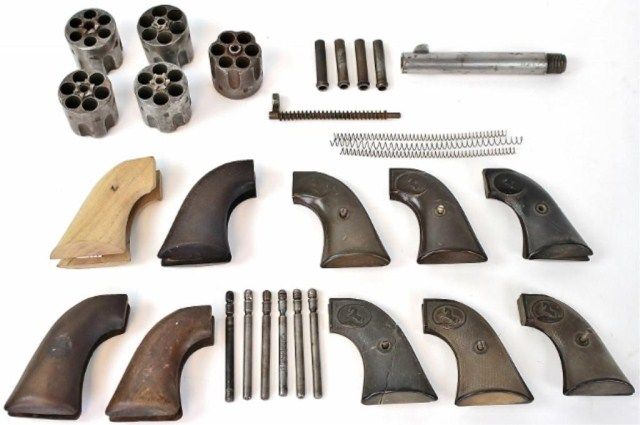 Misc. Colt parts includes 10 pair of grips, 1 5 1/2” .38 cal barrel, 5 ...
