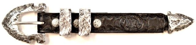 Sterling silver Ranger buckle set by noted Texas artist Matt Bubinghauser.