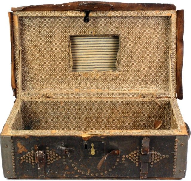 Early leather bound traveling stagecoach trunk with brass spots, cloth ...