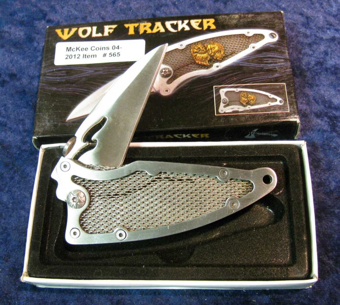 565. Wolf Tracker Folding Knife. New in box.