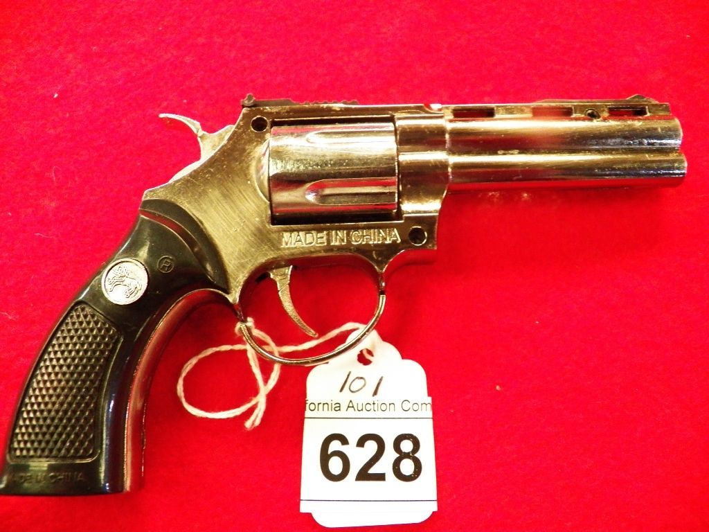 Gold Cigarette Gun Black Handles