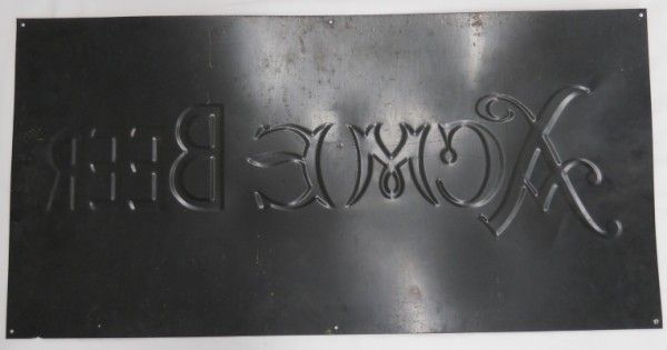 Acme Beer Embossed Tin Sign
