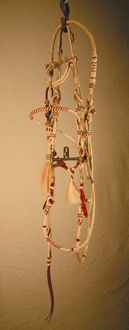 Cecil Connors, braided rawhide headstall and buckaroo reins, with ...