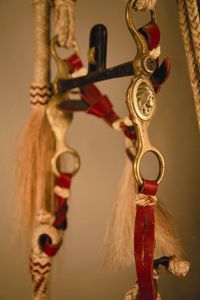 Cecil Connors, braided rawhide headstall and buckaroo reins, with ...