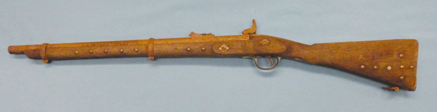English Tower 1862 Indian gun, many brass tacks