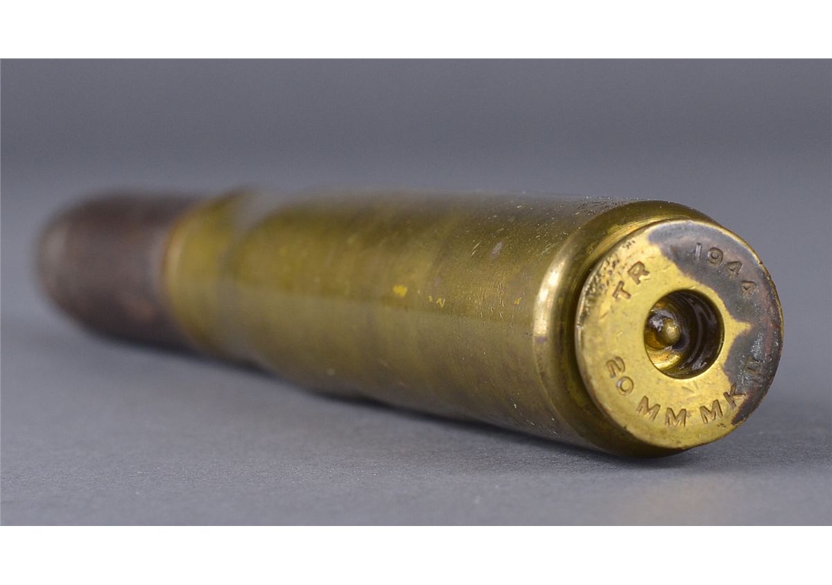 Set of Two: Brass Horse and World War II Bullet