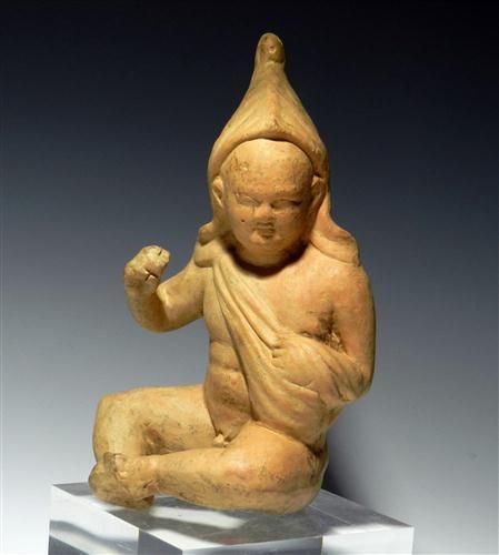 A Greek Terracotta Seated Figure of Attis