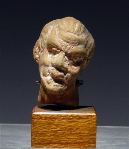 A Greek Hellenistic Terracotta Grotesque Head