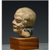 A Greek Hellenistic Terracotta Grotesque Head