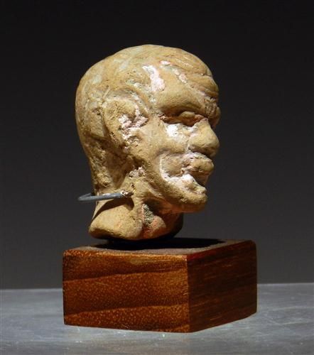 A Greek Hellenistic Terracotta Grotesque Head