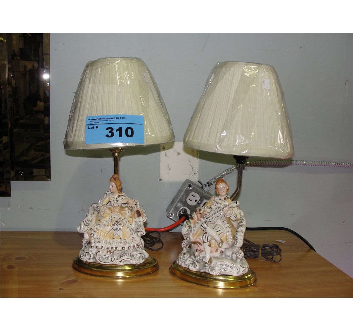 Pair of man and woman figurine table lamps