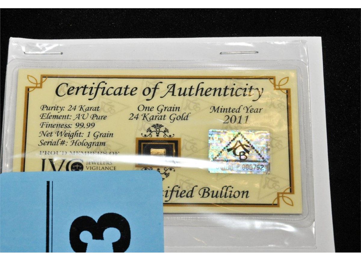 .999 solid gold mini bar and certificate