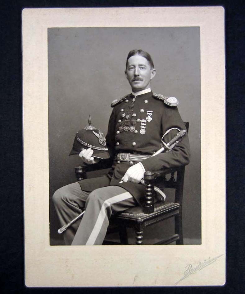 C. 1880'S MOUNTED PHOTO OF A US MILITARY SOLDIER IN UNIFORM