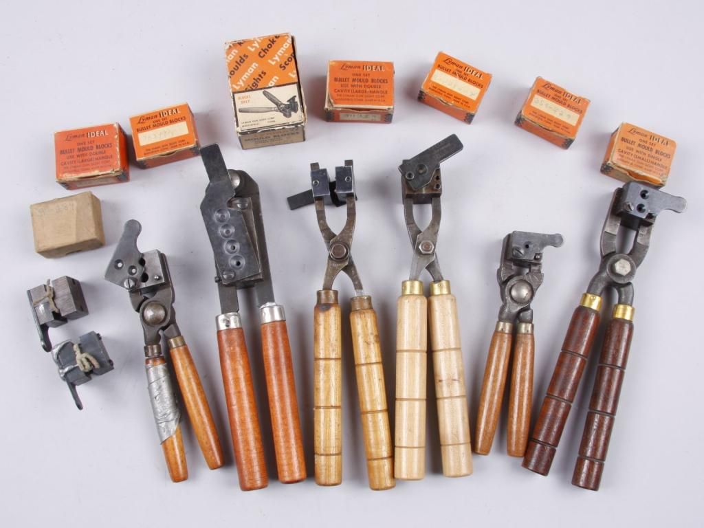 Box Lot of Lyman Bullet MoldsIncludes 16 molds and 6 sets of handles.