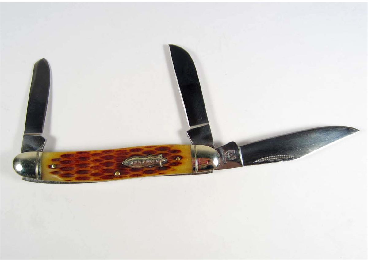 ROUGH RIDER STOCKMAN POCKET KNIFE W/ AMBER JIGGED BONE HANDLE