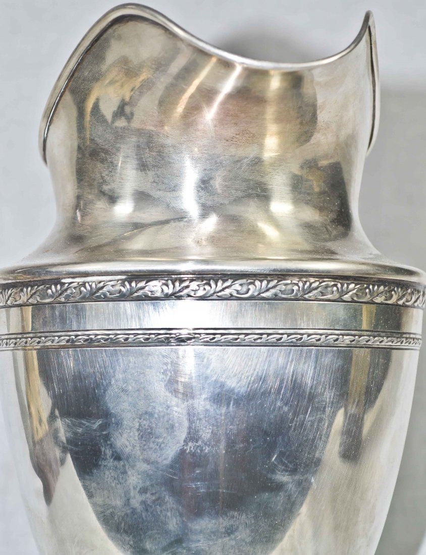 Antique large sterling silver pitcher. Hallmarked